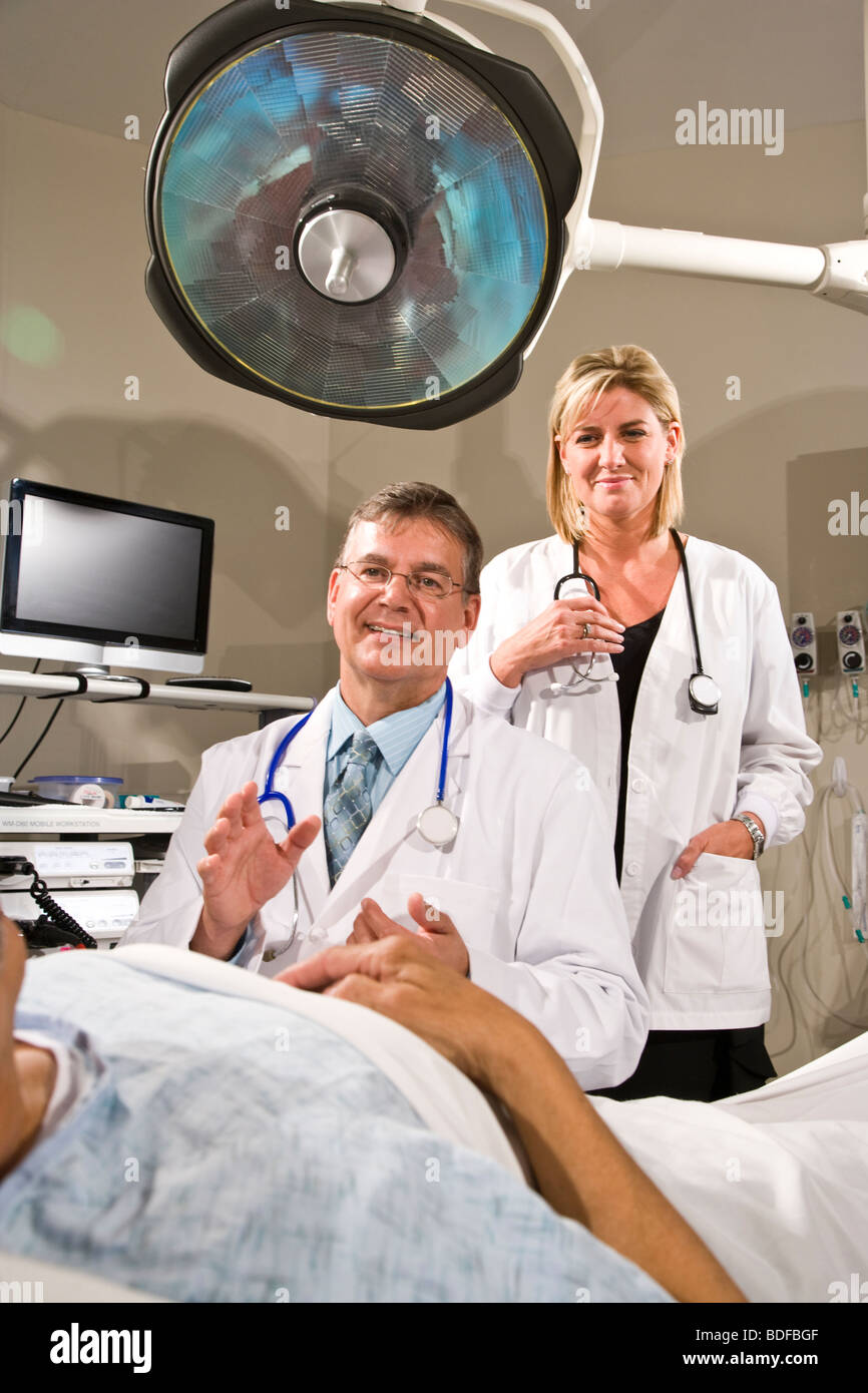 Medical assistant talking ill patient hi-res stock photography and ...