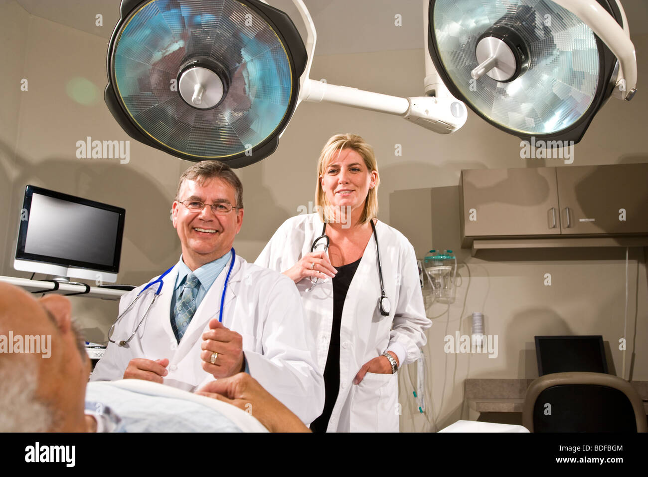 Medical assistant talking ill patient hi-res stock photography and ...