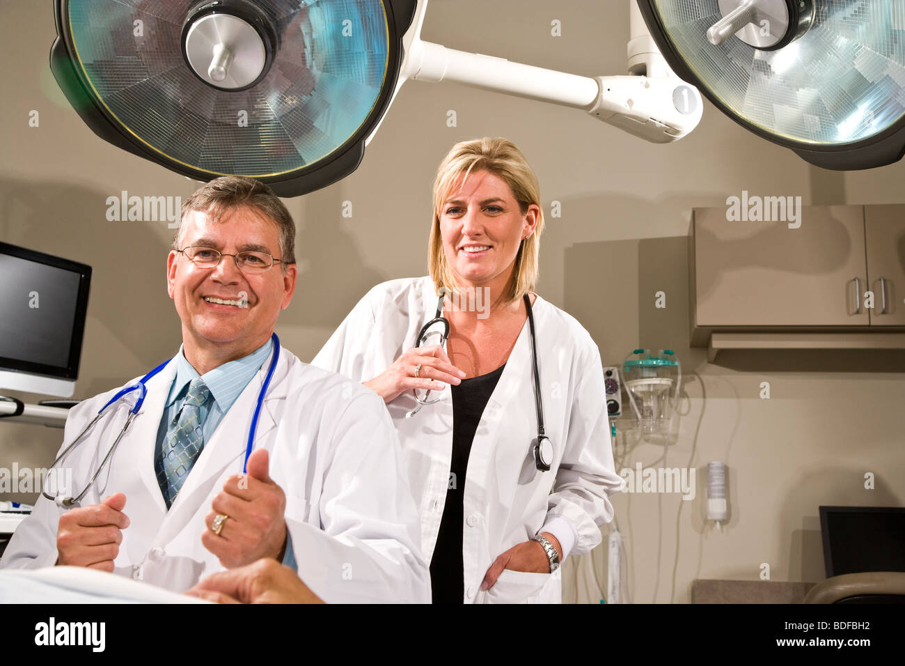 Happy patient in operating room hi-res stock photography and images - Alamy