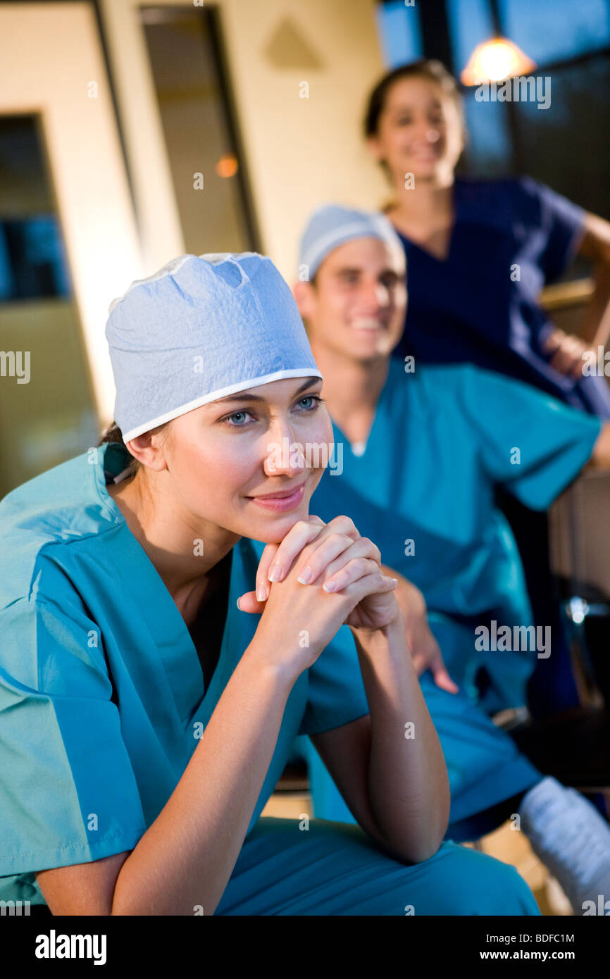 Doctor tired blue scrubs hi-res stock photography and images - Alamy