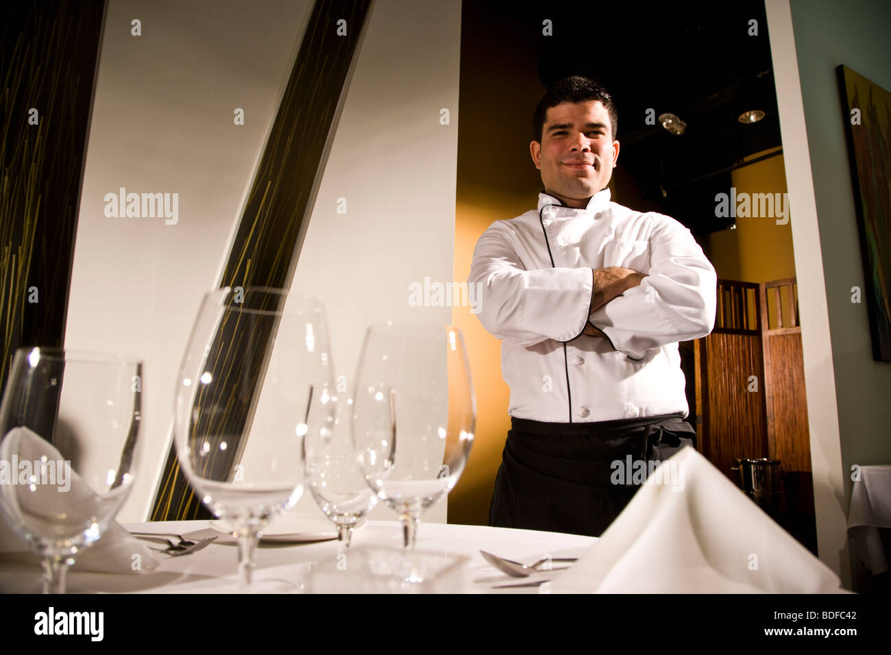 Professional chef standing in fine dining restaurant Stock Photo - Alamy
