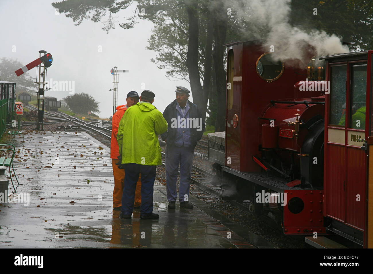 A conversation between driver, fireman and guard at Woody Bay station ...