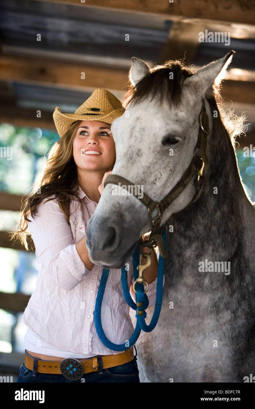 Cowgirl, horse, western, walking hi-res stock photography and images ...