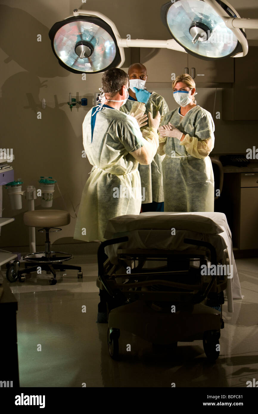 Surgeons conferring in hospital room Stock Photo - Alamy