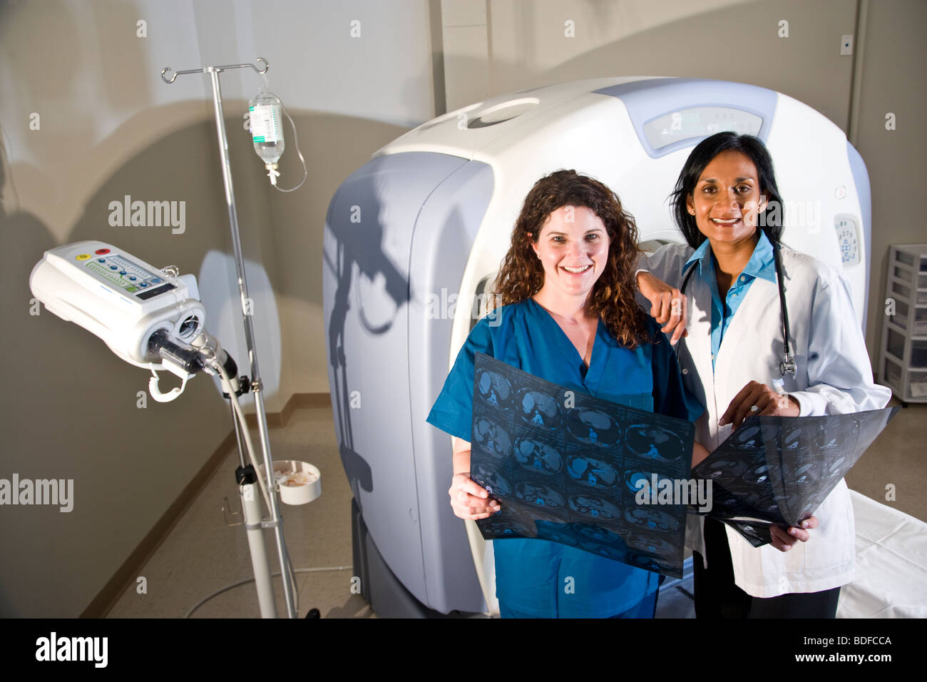 Doctor reviewing ct scan results hi-res stock photography and images ...