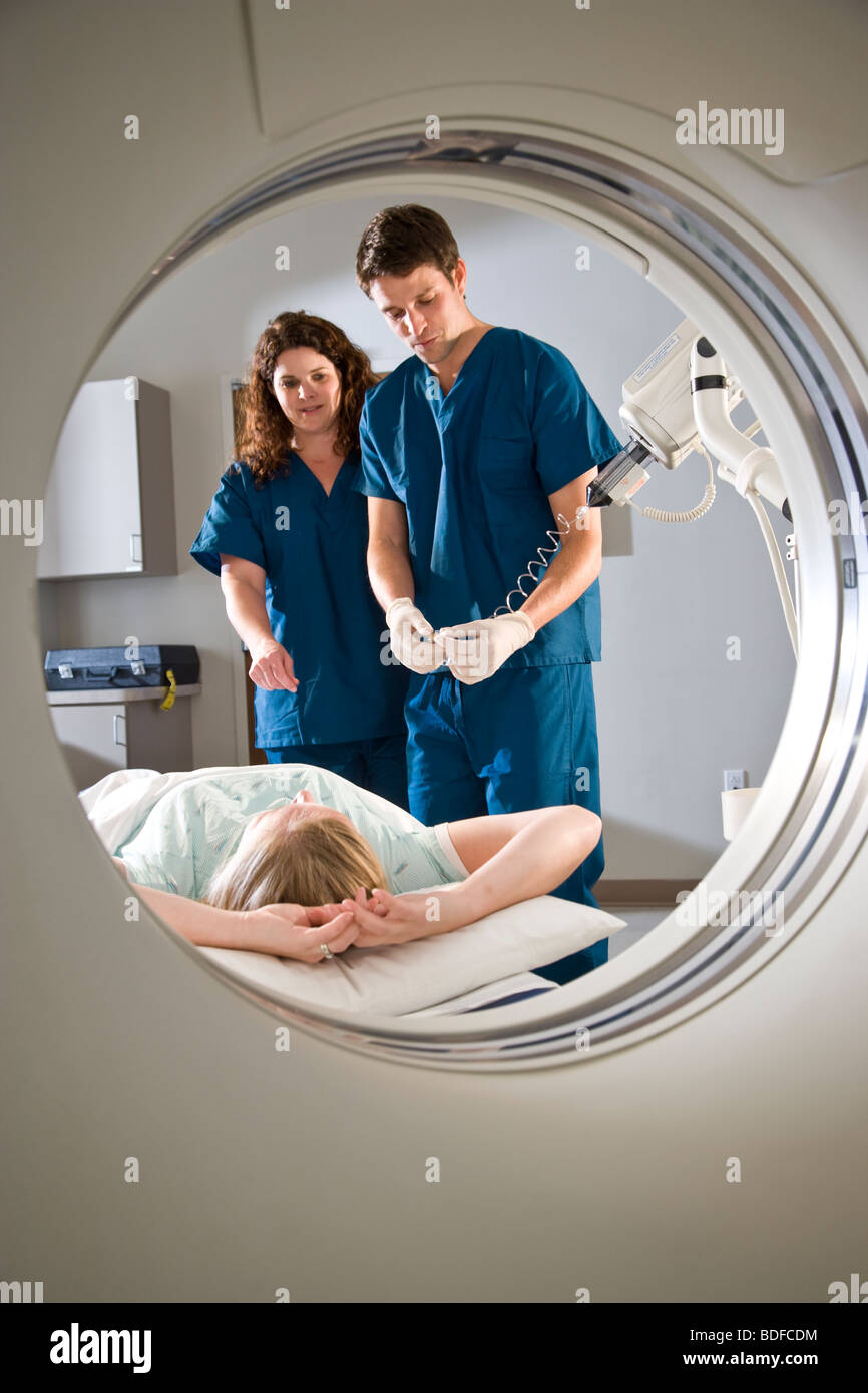 Doctor preparing woman ct scan hi-res stock photography and images - Alamy