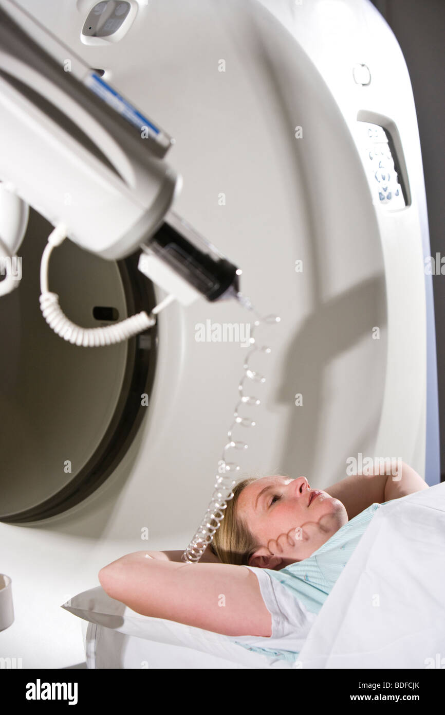 Female patient ready to have CAT scan Stock Photo - Alamy