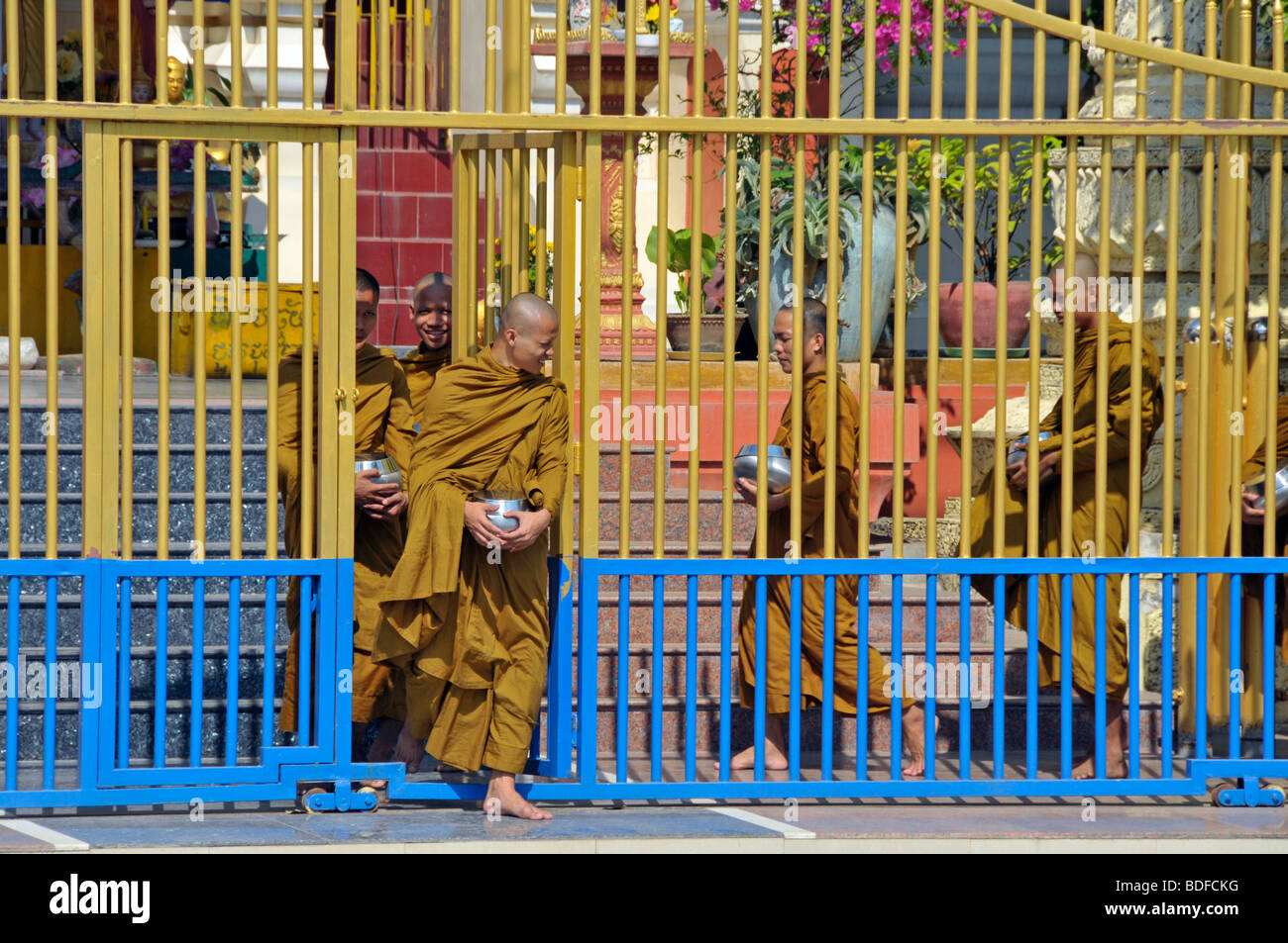 Monks leaving their monastery to go begging for alms, Binhabad with ...
