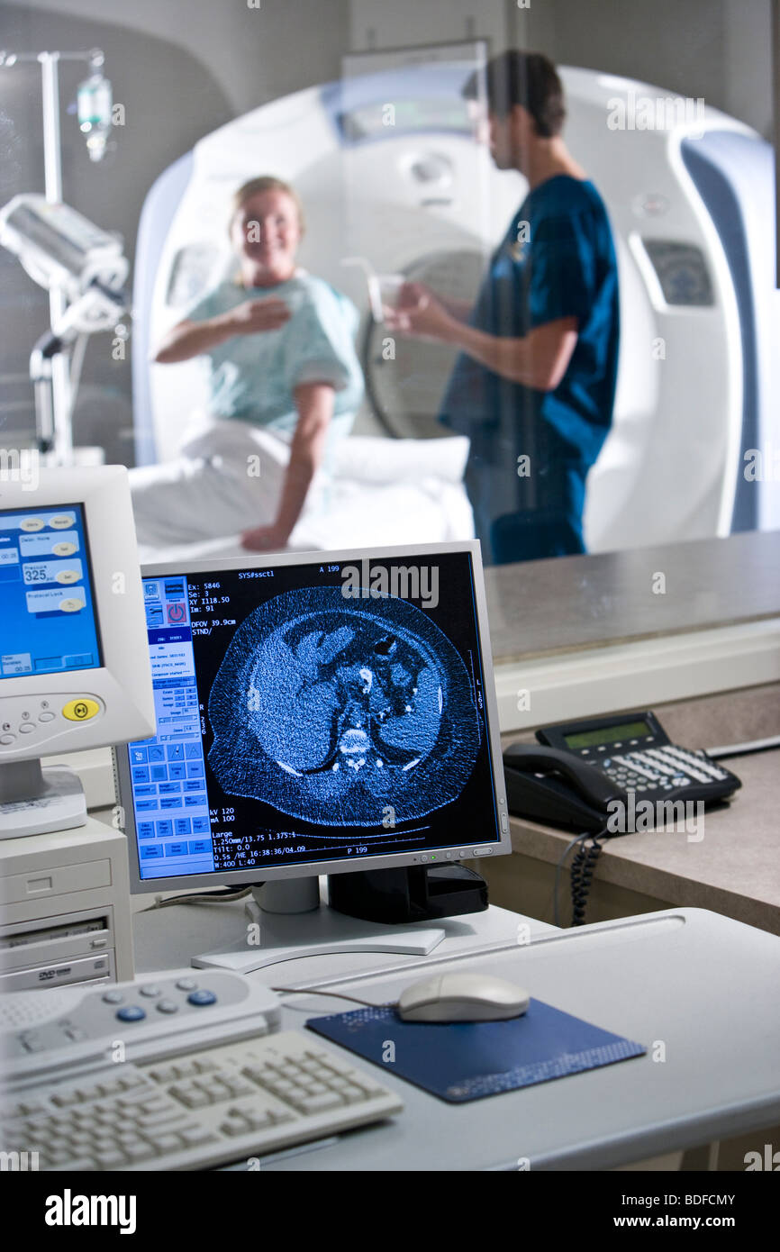 Doctor monitors patient on monitor at ct hi-res stock photography and ...
