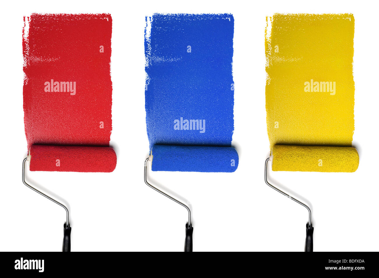 Paint Rollers with primary colors isolated over white background Stock ...