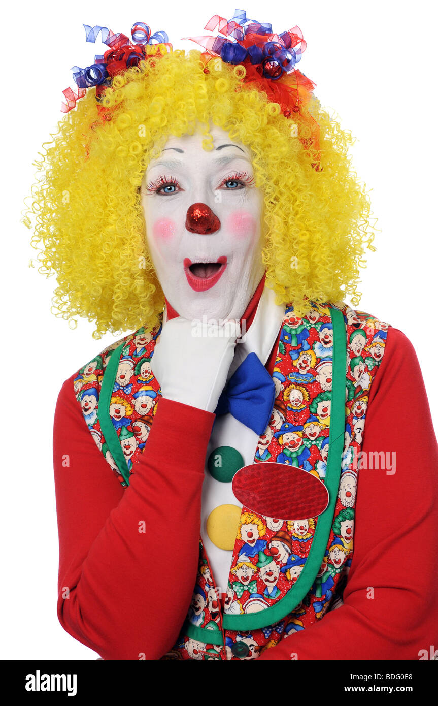 Female clown expressing surprise isolated over white background Stock ...