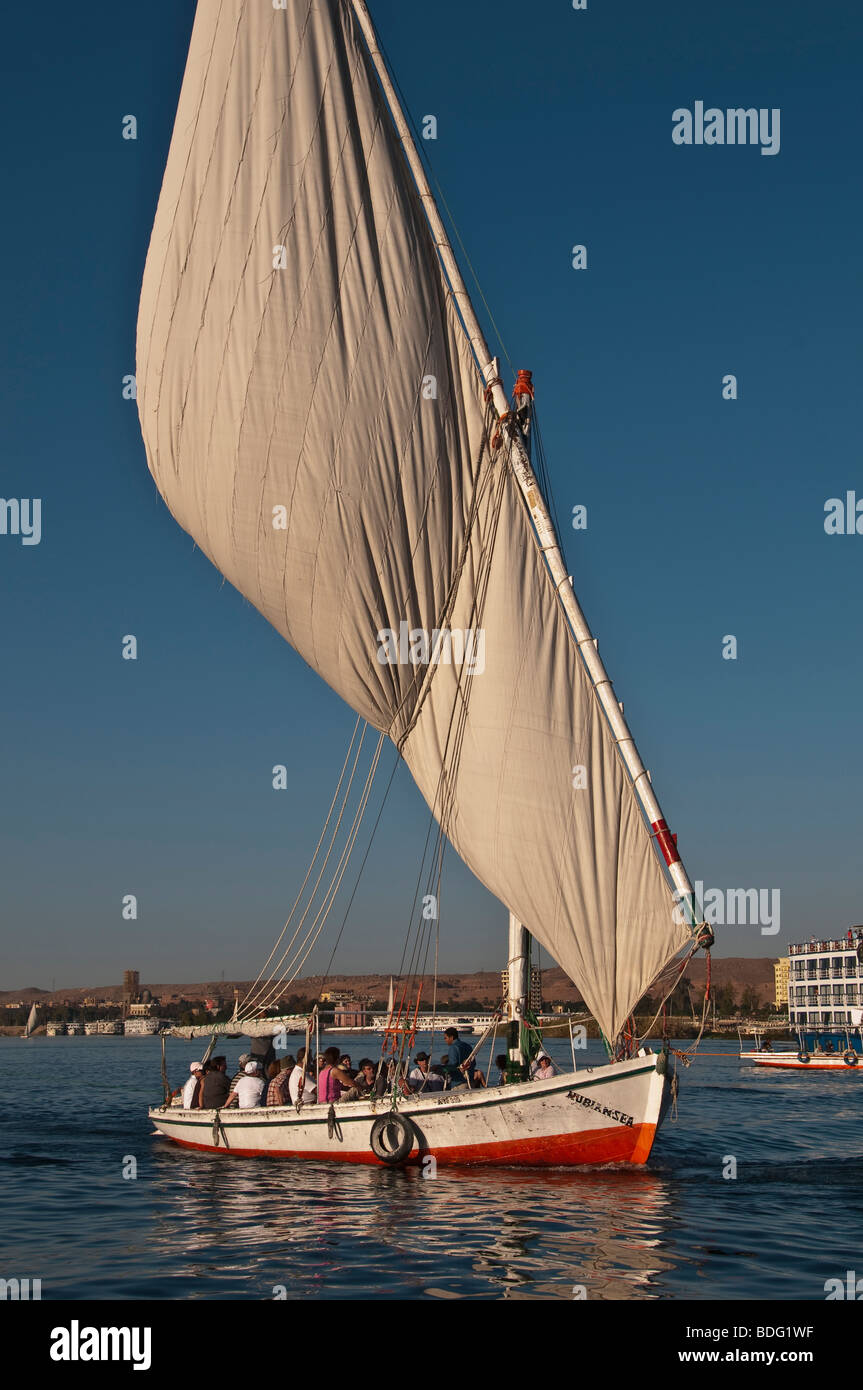 Felucca traditional wooden sailboat portrait on Nile River Aswan Egypt ...