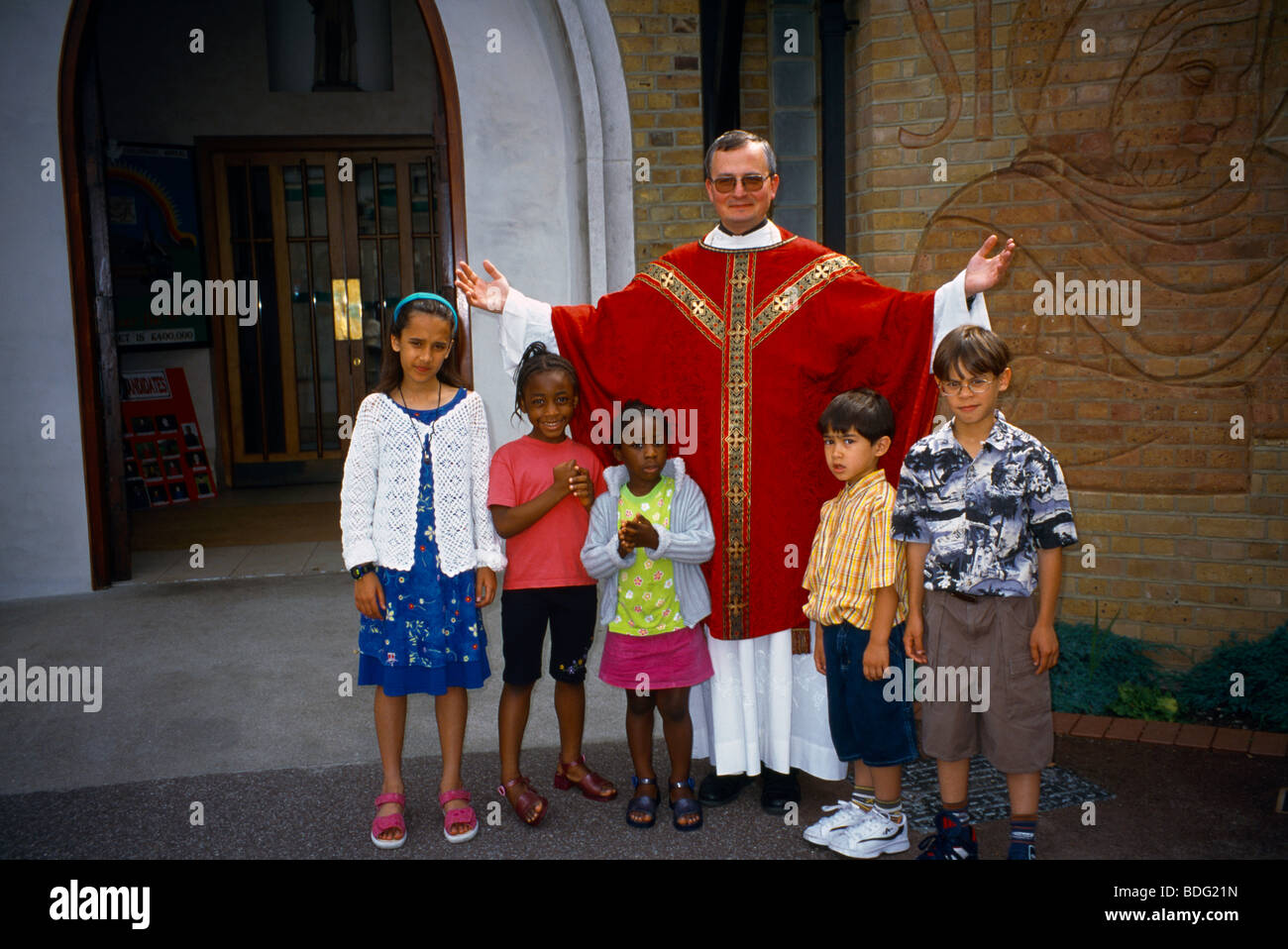 St Joseph's Church Priest With Outstretched Hands Upwards & Children ...