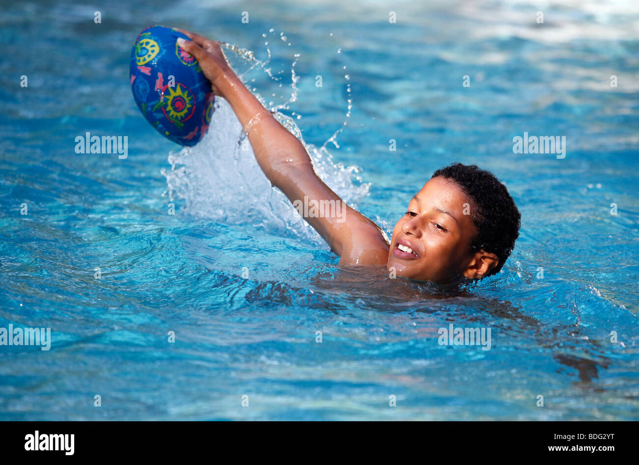 11 year old boy in a backyard swimming pool Stock Photo - Alamy