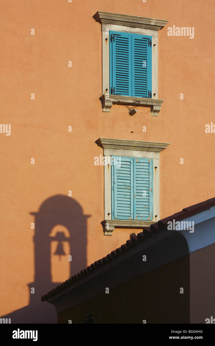 Windows and a bell shadow Stock Photo - Alamy