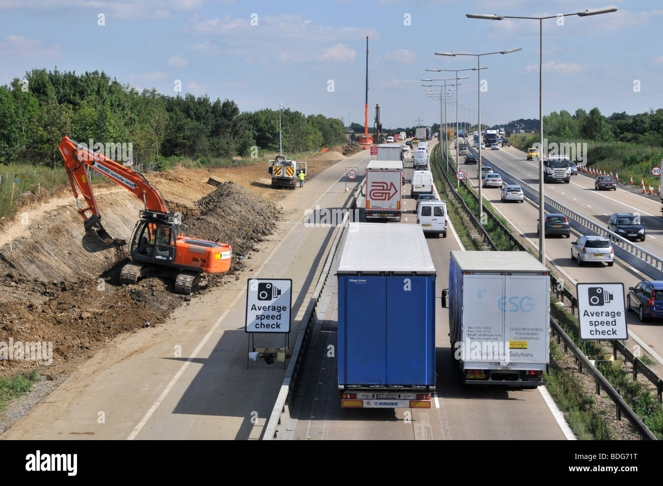 M25 road widening project with contra flow in operation Stock Photo - Alamy