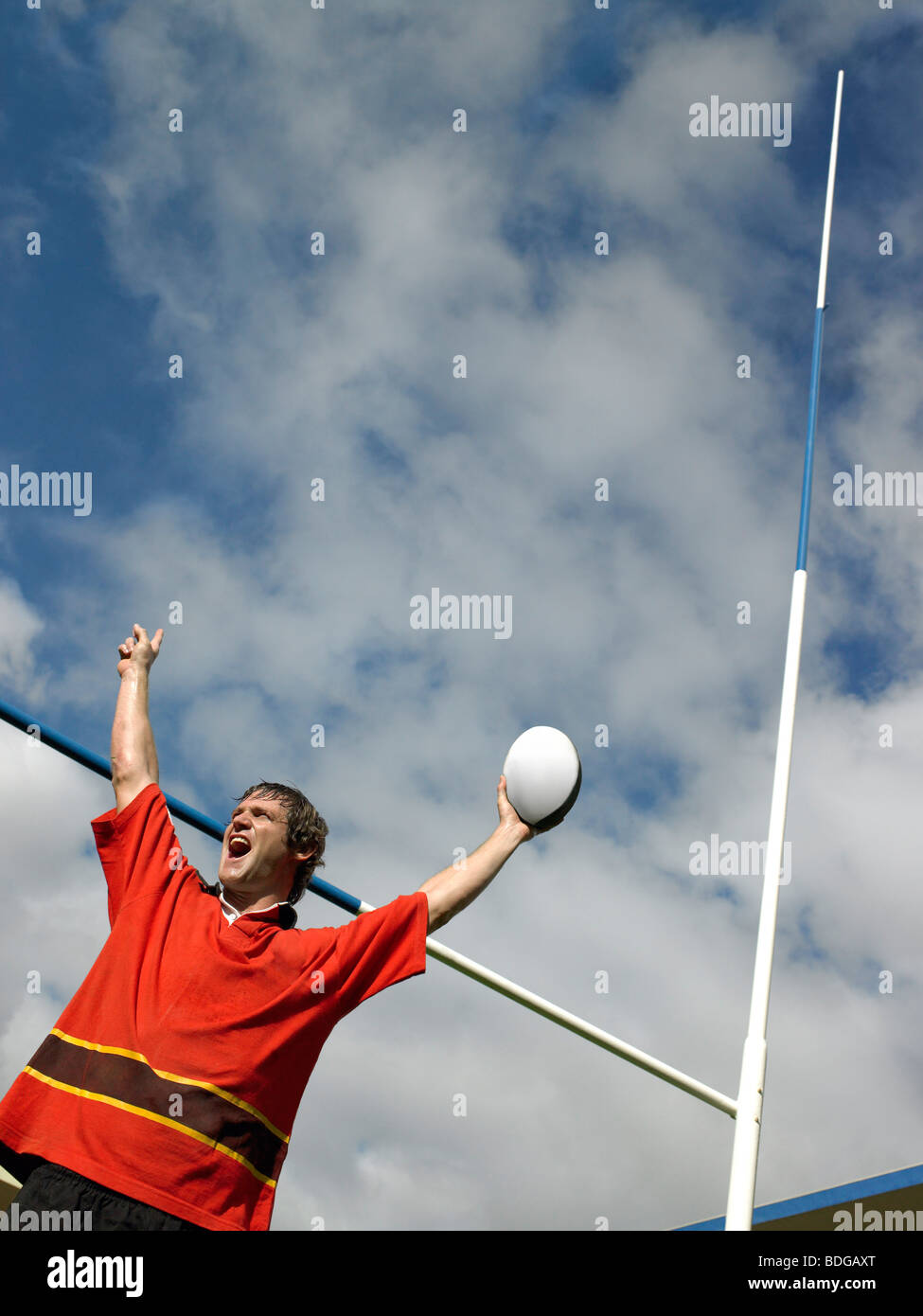 Rugby player celebrating Stock Photo - Alamy