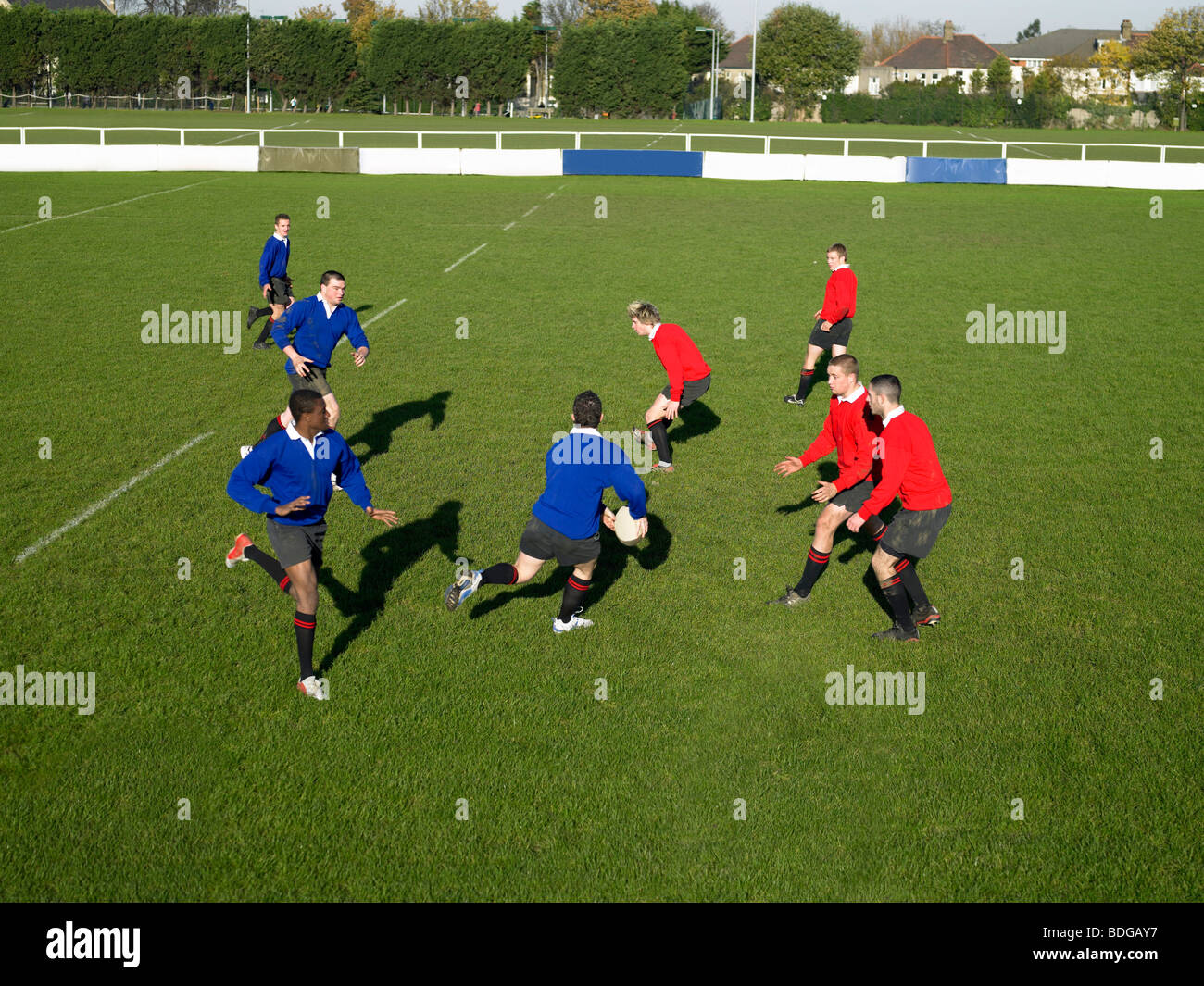 Men playing rugby Stock Photo - Alamy