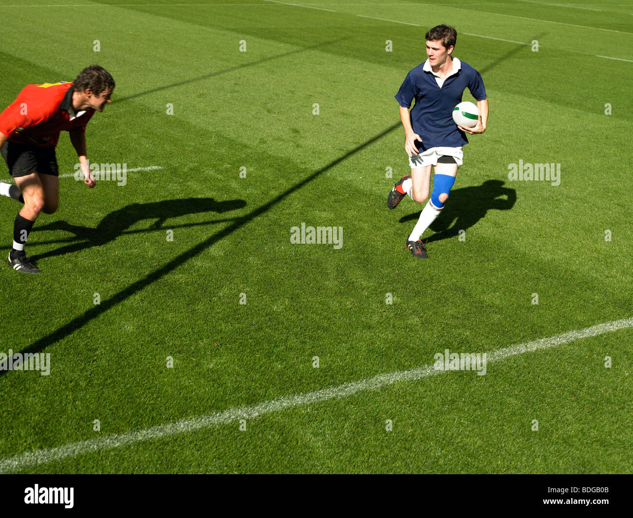 Playing rugby player Stock Photo - Alamy
