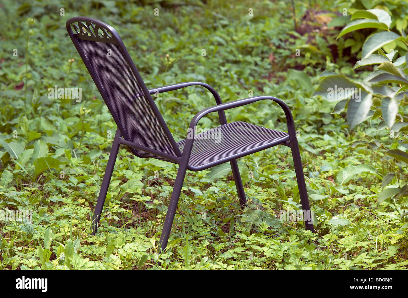 Empty garden chair Stock Photo - Alamy