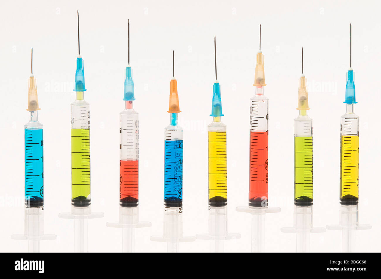 Coloured syringes hi-res stock photography and images - Alamy