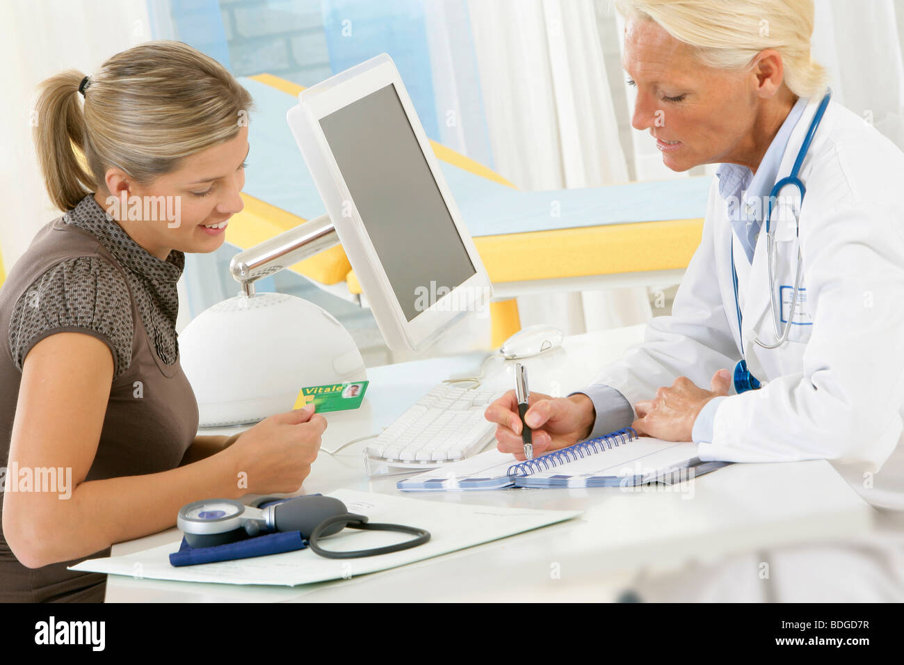 WOMAN AT HOSPITAL CONSULTATION Stock Photo - Alamy
