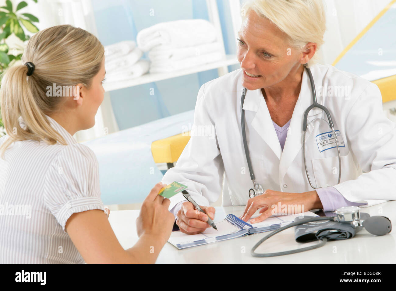 WOMAN AT HOSPITAL CONSULTATION Stock Photo - Alamy