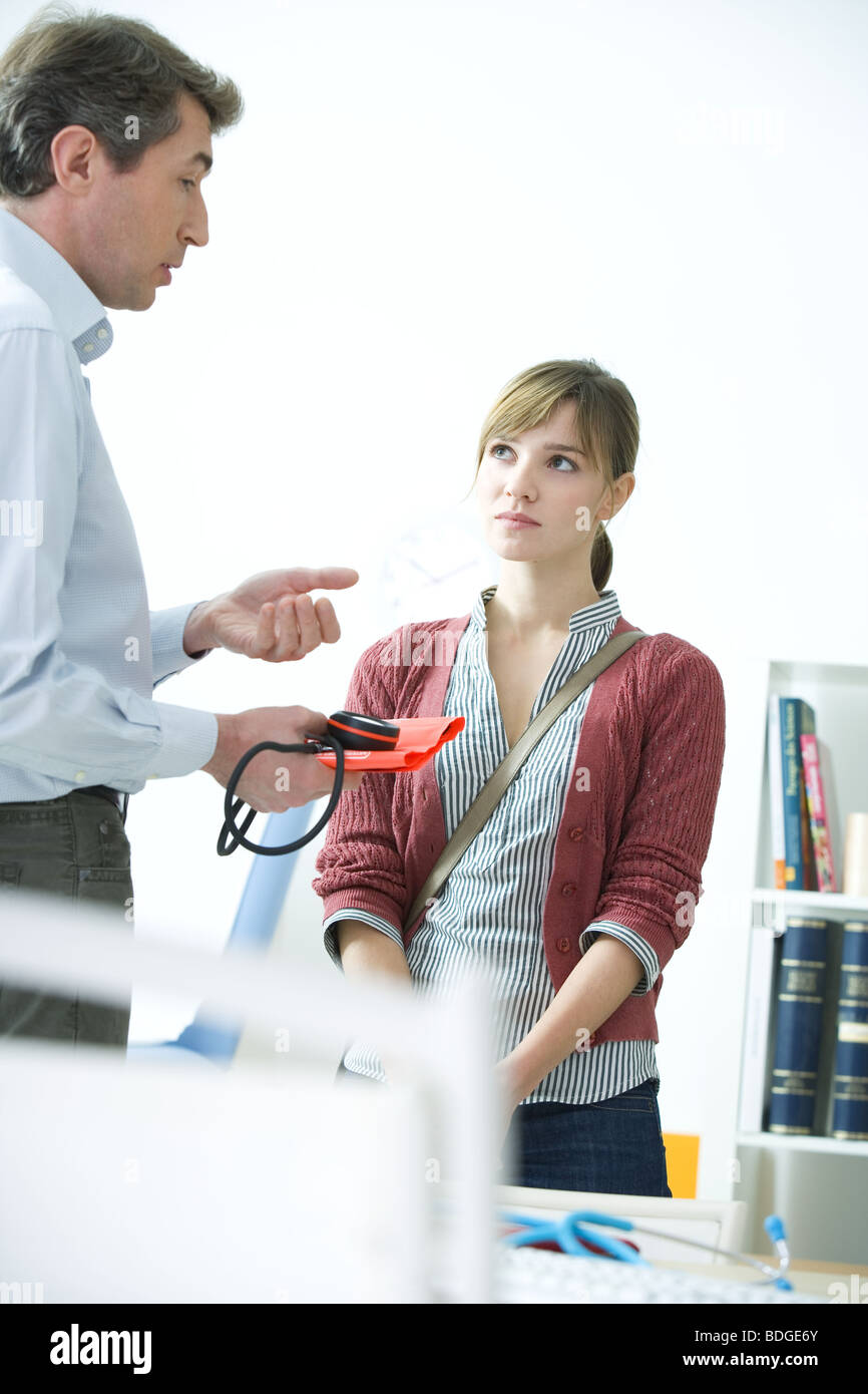 WOMAN IN CONSULTATION, DIALOGUE Stock Photo - Alamy
