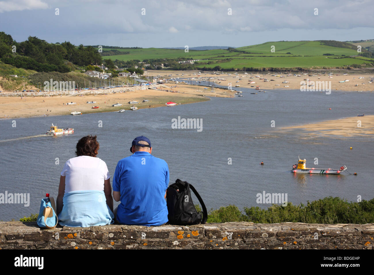 Holidaymakers enjoying the view across the Camel Estuary towards Rock ...