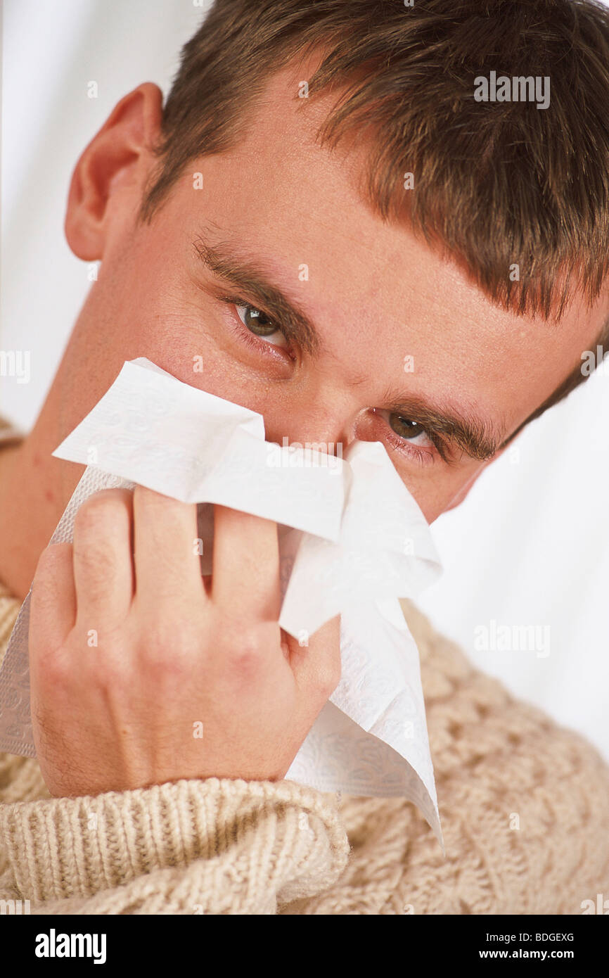 MAN WITH RHINITIS Stock Photo - Alamy