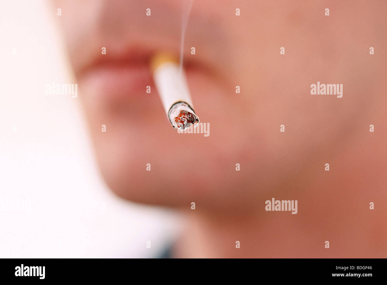 MAN SMOKING Model Stock Photo - Alamy