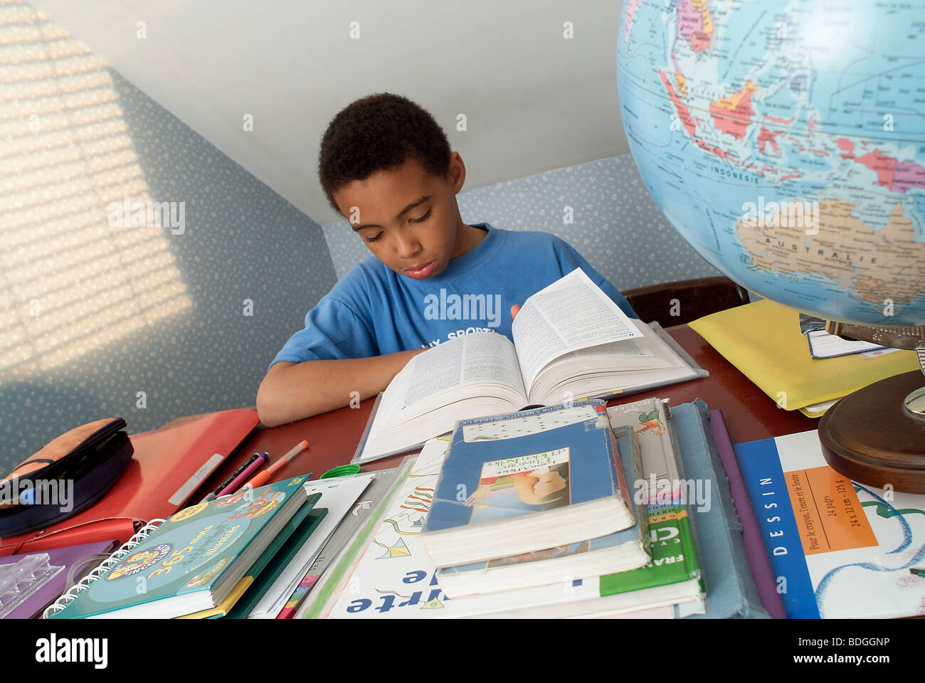 CHILD DOING HOMEWORK Stock Photo - Alamy