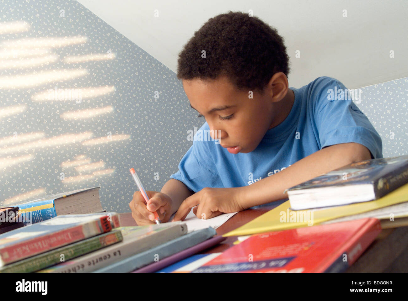 CHILD DOING HOMEWORK Stock Photo - Alamy
