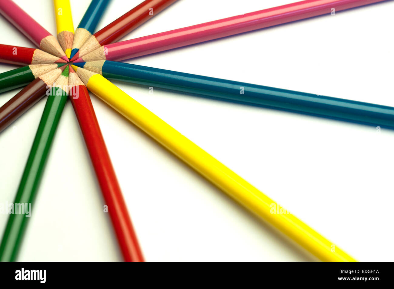 Coloured Pencils arranged in a 'sun' formation Stock Photo - Alamy