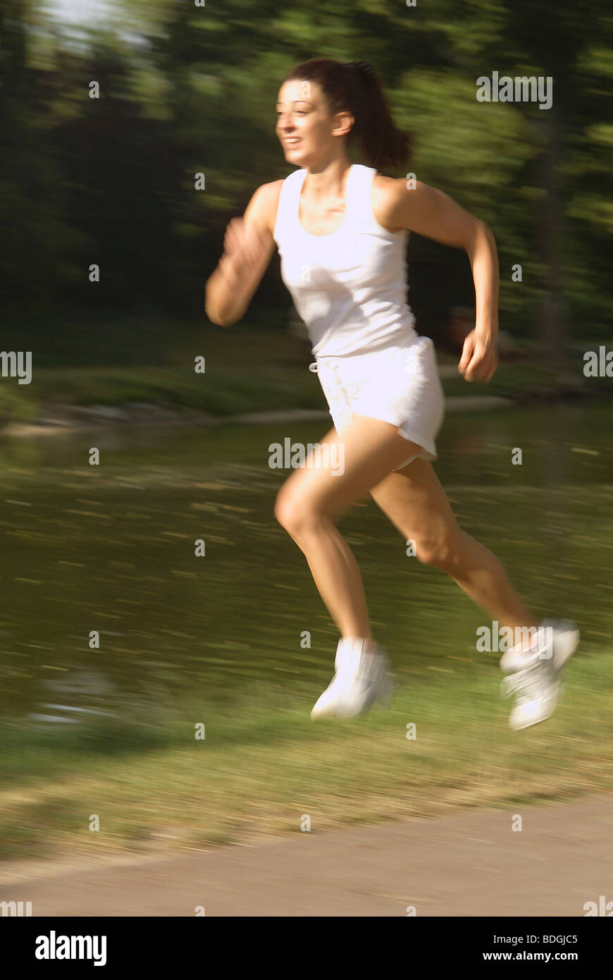 Female athletes running blurred hi-res stock photography and images - Alamy