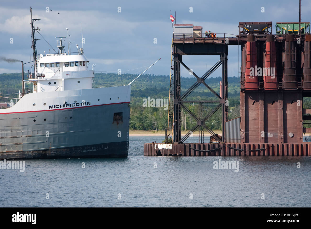 A freighter coming in to the iron ore loading dock at Marquette ...