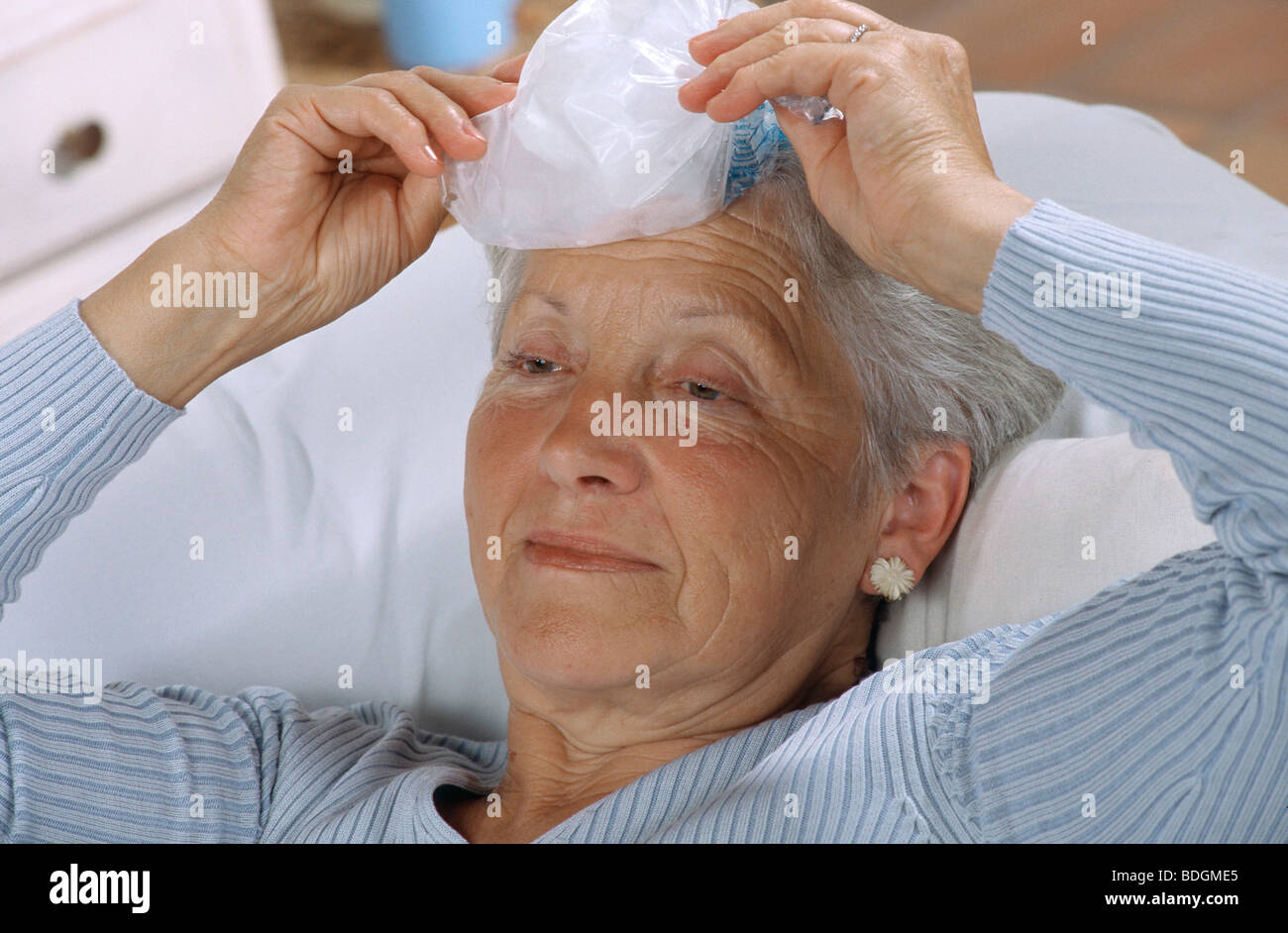 COLD THERAPY ELDERLY PERSON Stock Photo - Alamy
