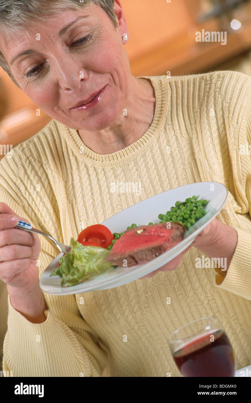 ELDERLY PEOPLE EATING A MEAL Stock Photo - Alamy