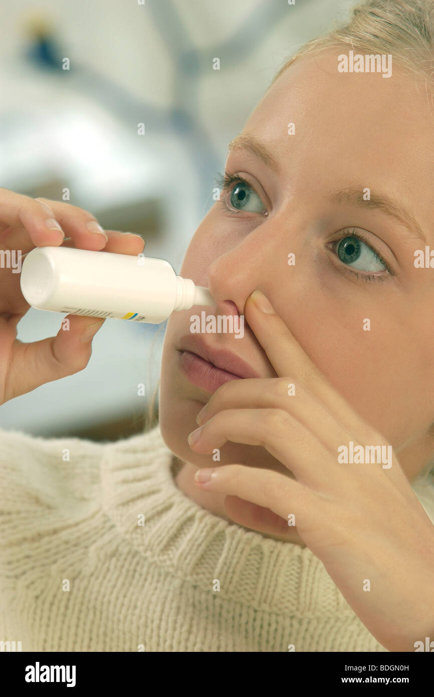 Lady ear drops hi-res stock photography and images - Alamy