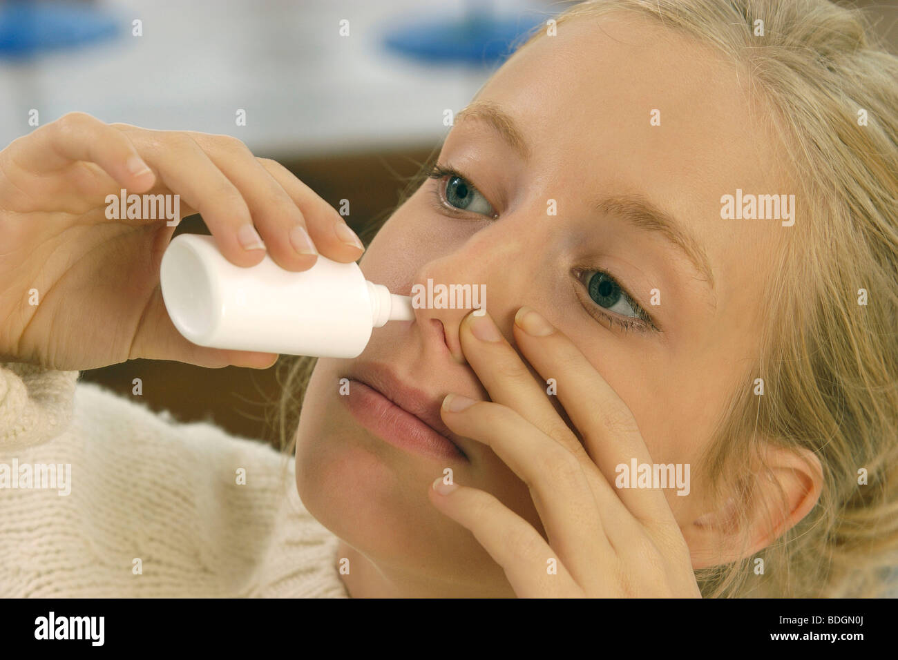 Lady ear drops hi-res stock photography and images - Alamy