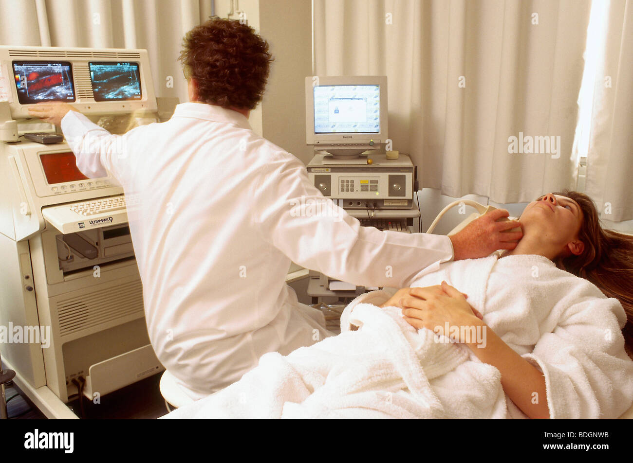 Carotid artery examination woman hi-res stock photography and images ...