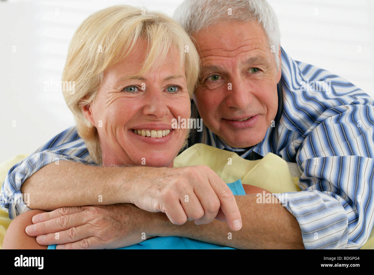 COUPLE IN THEIR 50S, INSIDE Stock Photo - Alamy