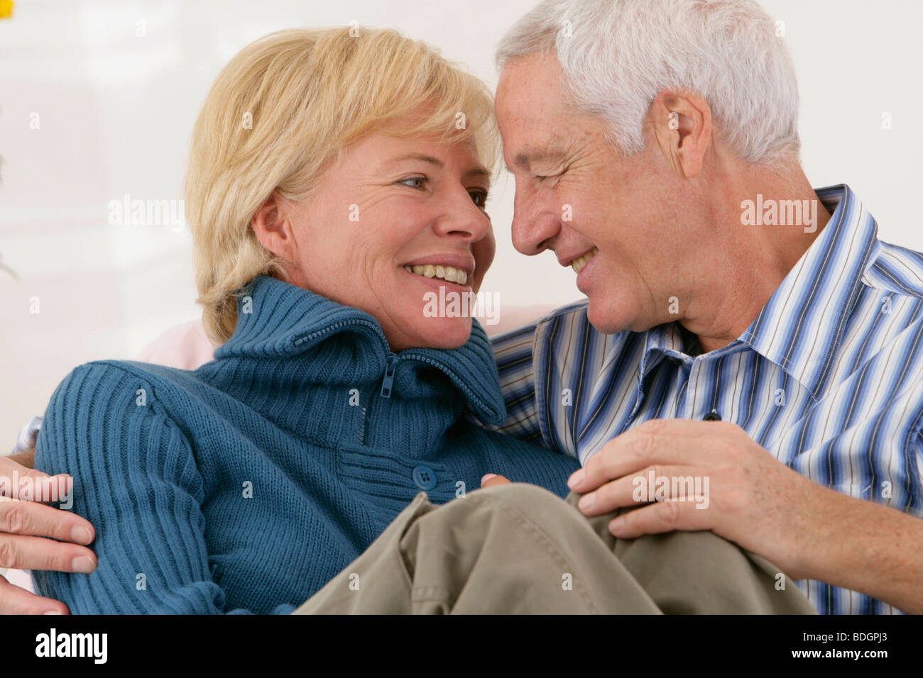COUPLE IN THEIR 50S, INSIDE Stock Photo - Alamy