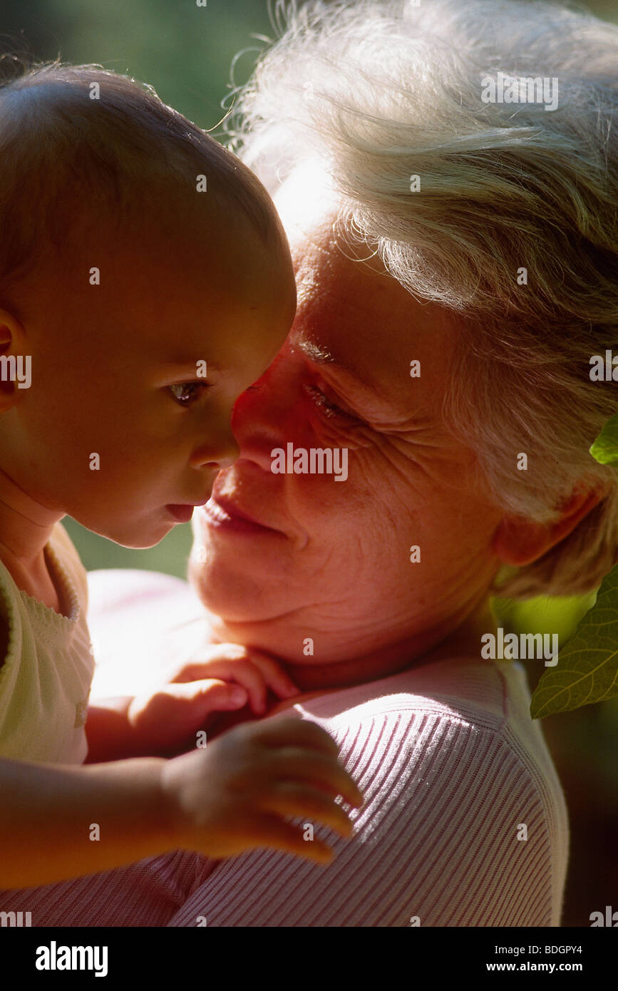 ELDERLY PERSON & INFANT Stock Photo - Alamy
