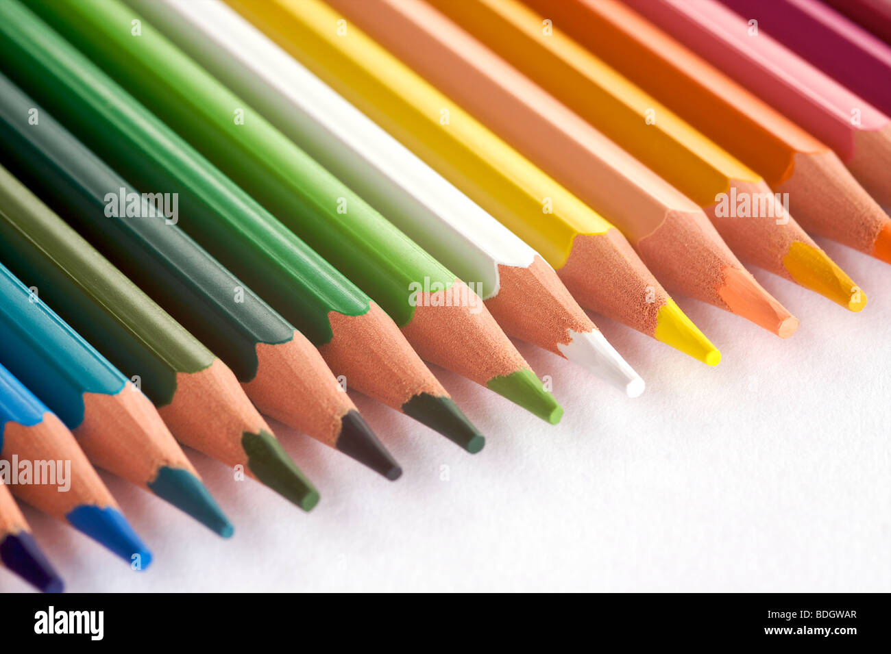 a row of sharp coloured pencils Stock Photo - Alamy