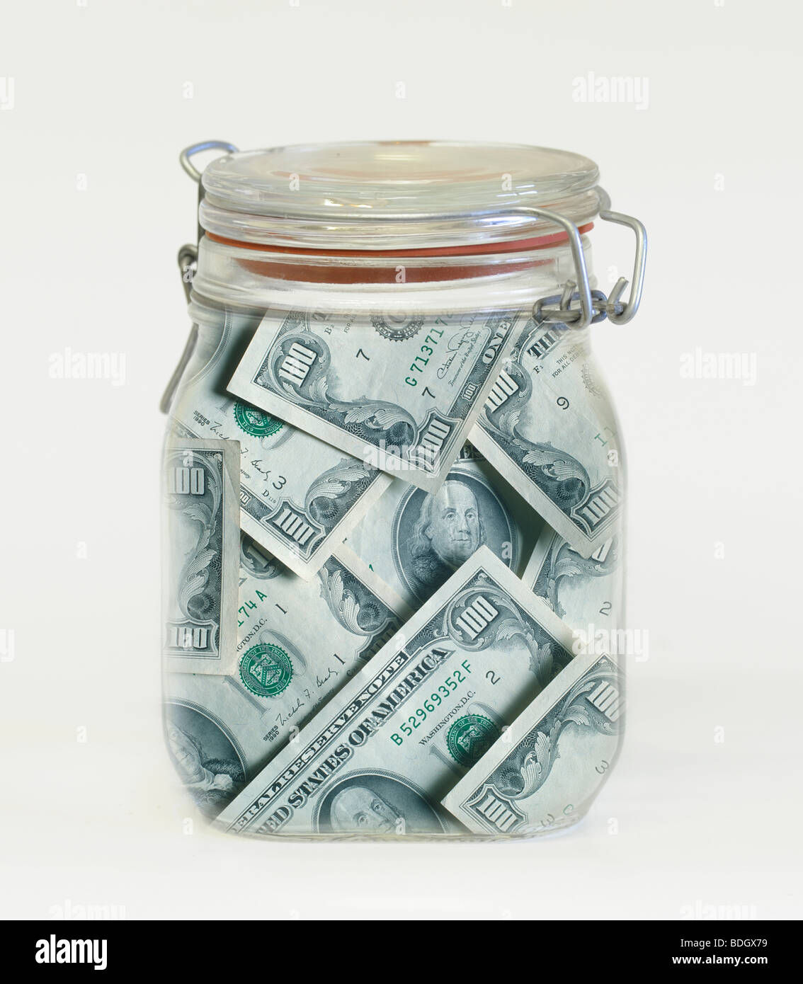 jar filled with $100 bills Stock Photo - Alamy