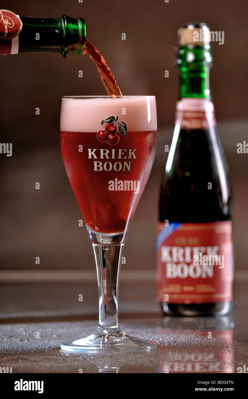 Pouring glass of Kriek Boon Belgian fruit beer Stock Photo - Alamy