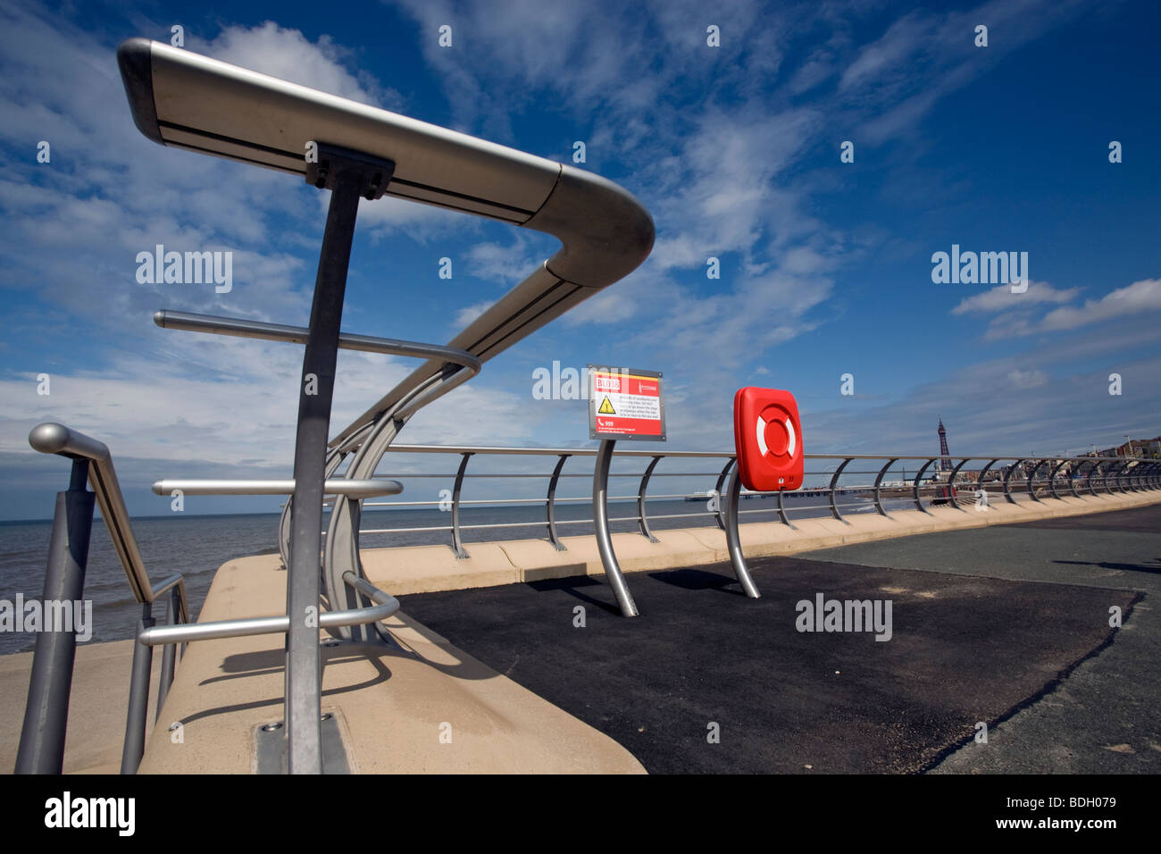 Blackpool Promenade with life belt station and warning sign Stock Photo ...