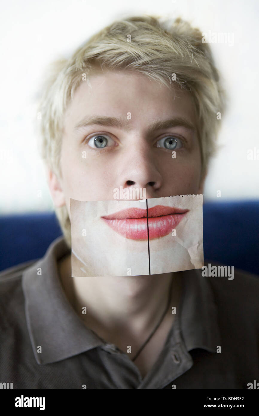 I want this kind of lips. Young man with strange lips Stock Photo - Alamy