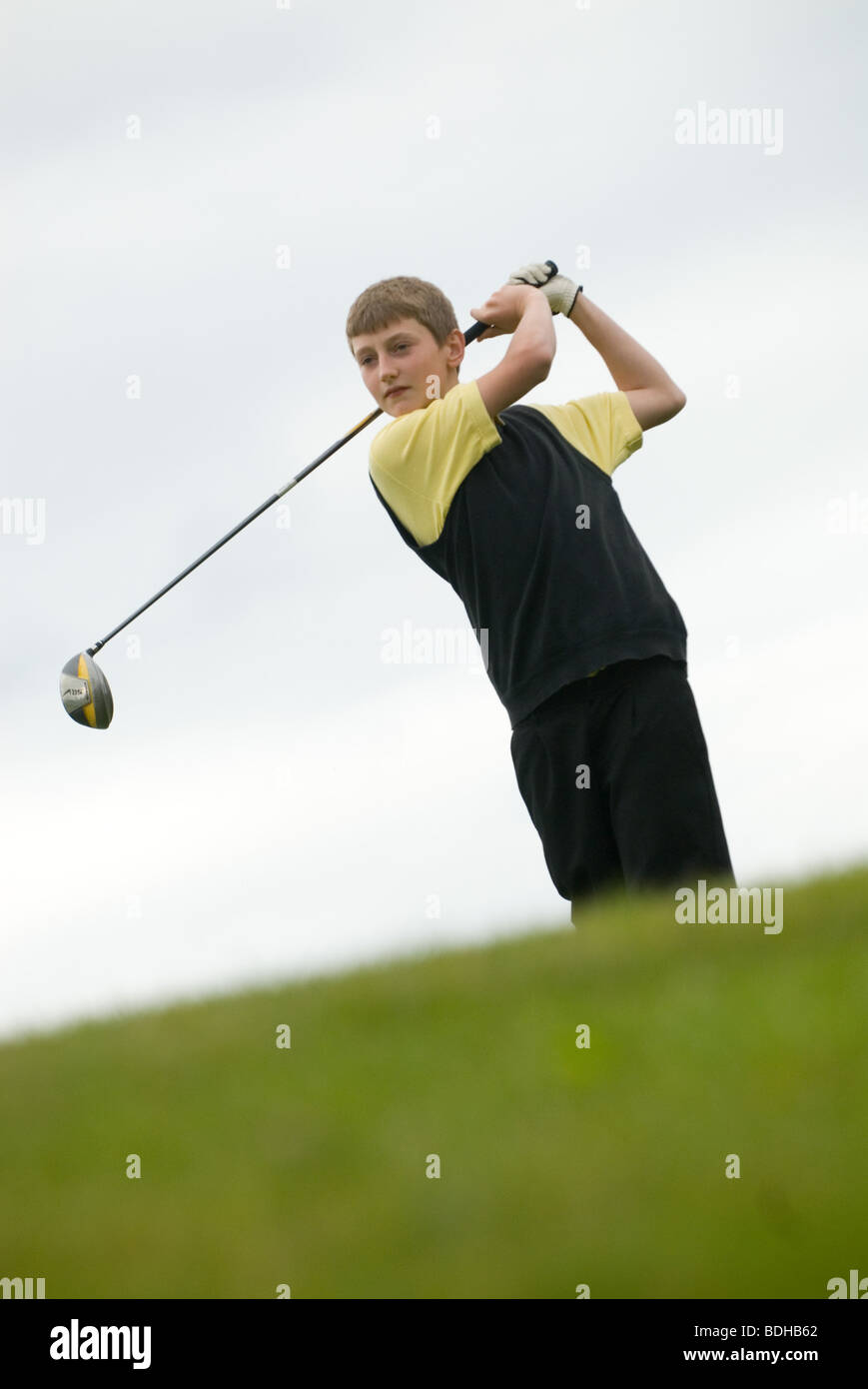 A young golfer on the golf course Stock Photo - Alamy